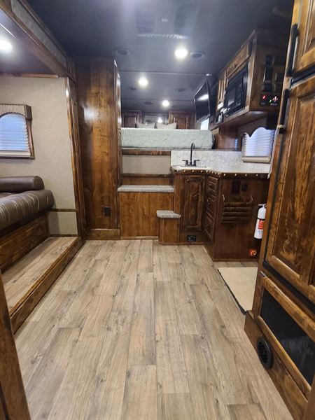 2026 Platinum Coach Outlaw 3H 10' 8" SW SLIDE OUT & Side Load with Ona